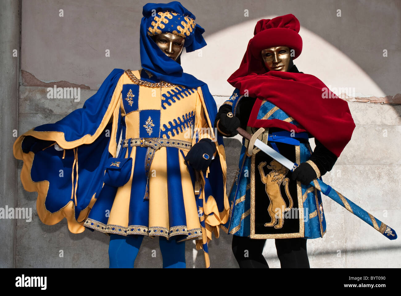 Couple of Venetian masks during carnival in Medieval disguise with ...