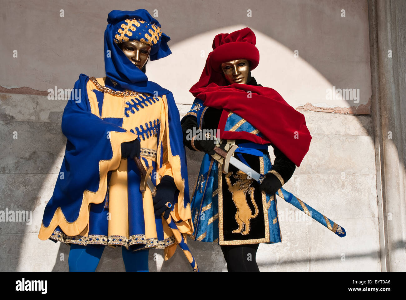 Couple of Venetian masks during carnival in Medieval disguise with ...