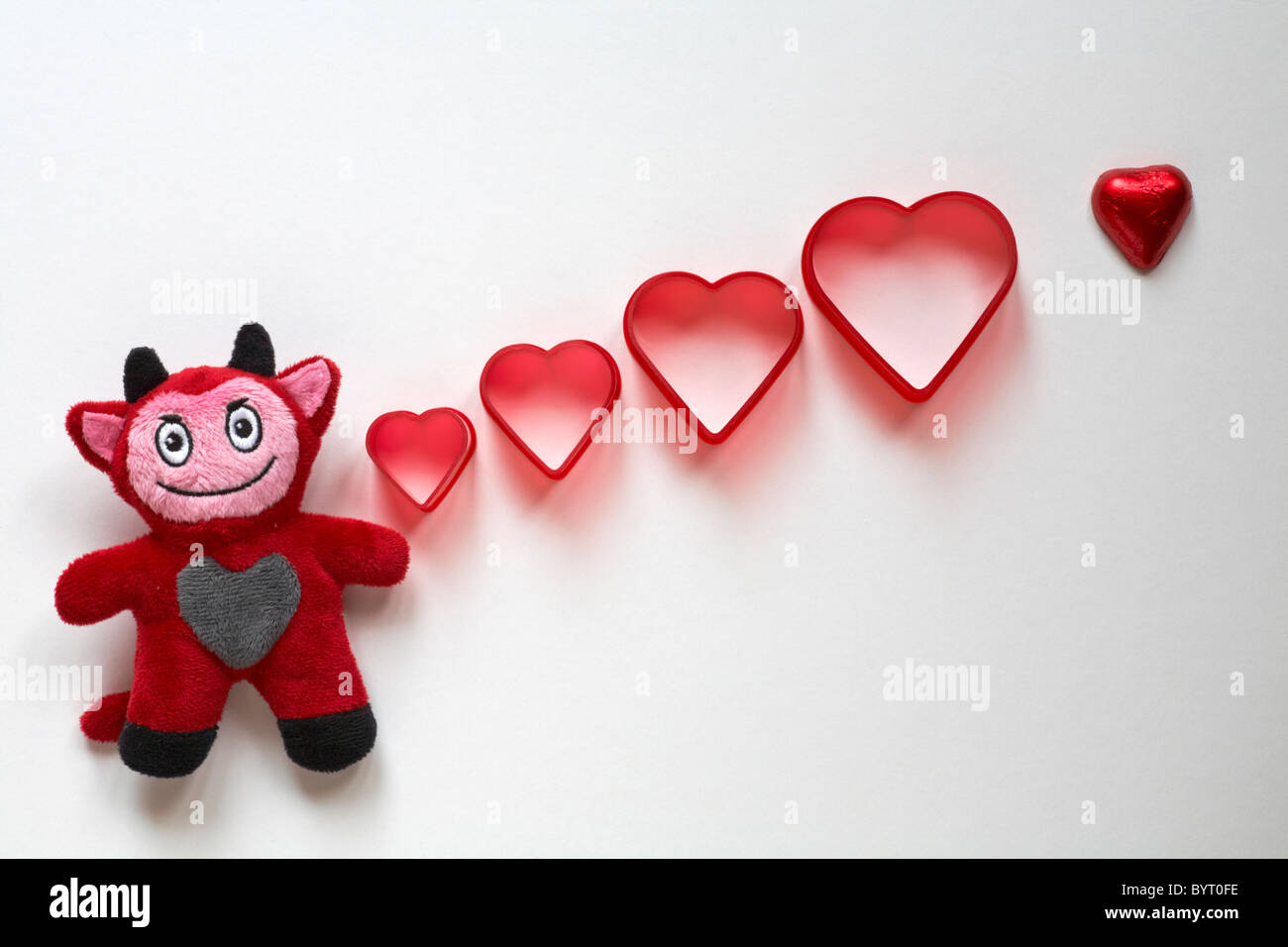 The devil loves chocolate concept - little devil soft cuddy toy with ...