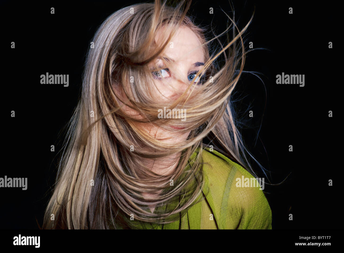 healthy beautiful long hair in motion created by wind, fashion look ...