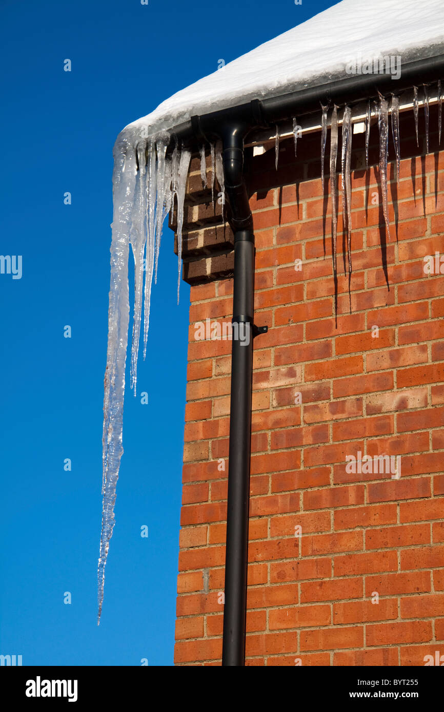Icicles on House Stock Photo - Alamy