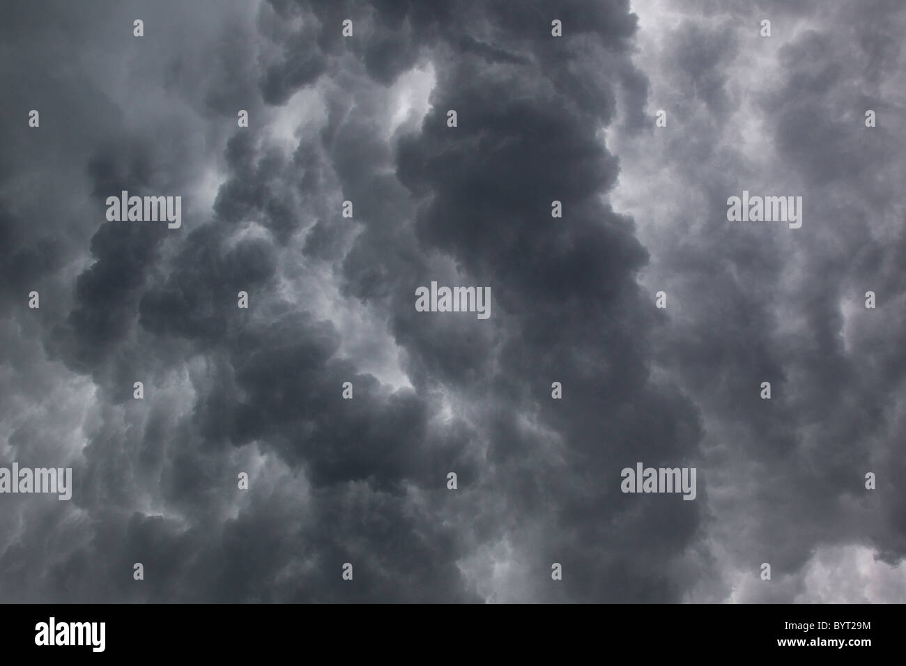 Dark ominous storm clouds billowing Stock Photo - Alamy