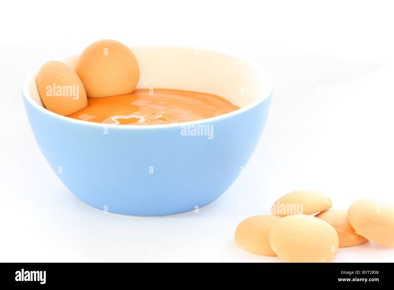 Close up view of hot baby fruit pap /mush in blue bowl - with several ...
