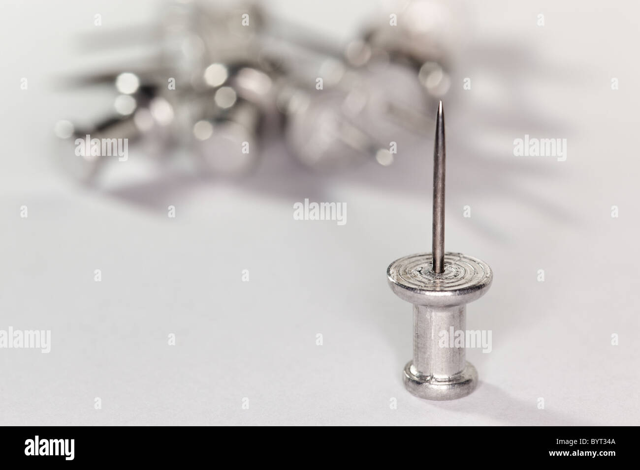 thumbtacks on white macro Stock Photo - Alamy