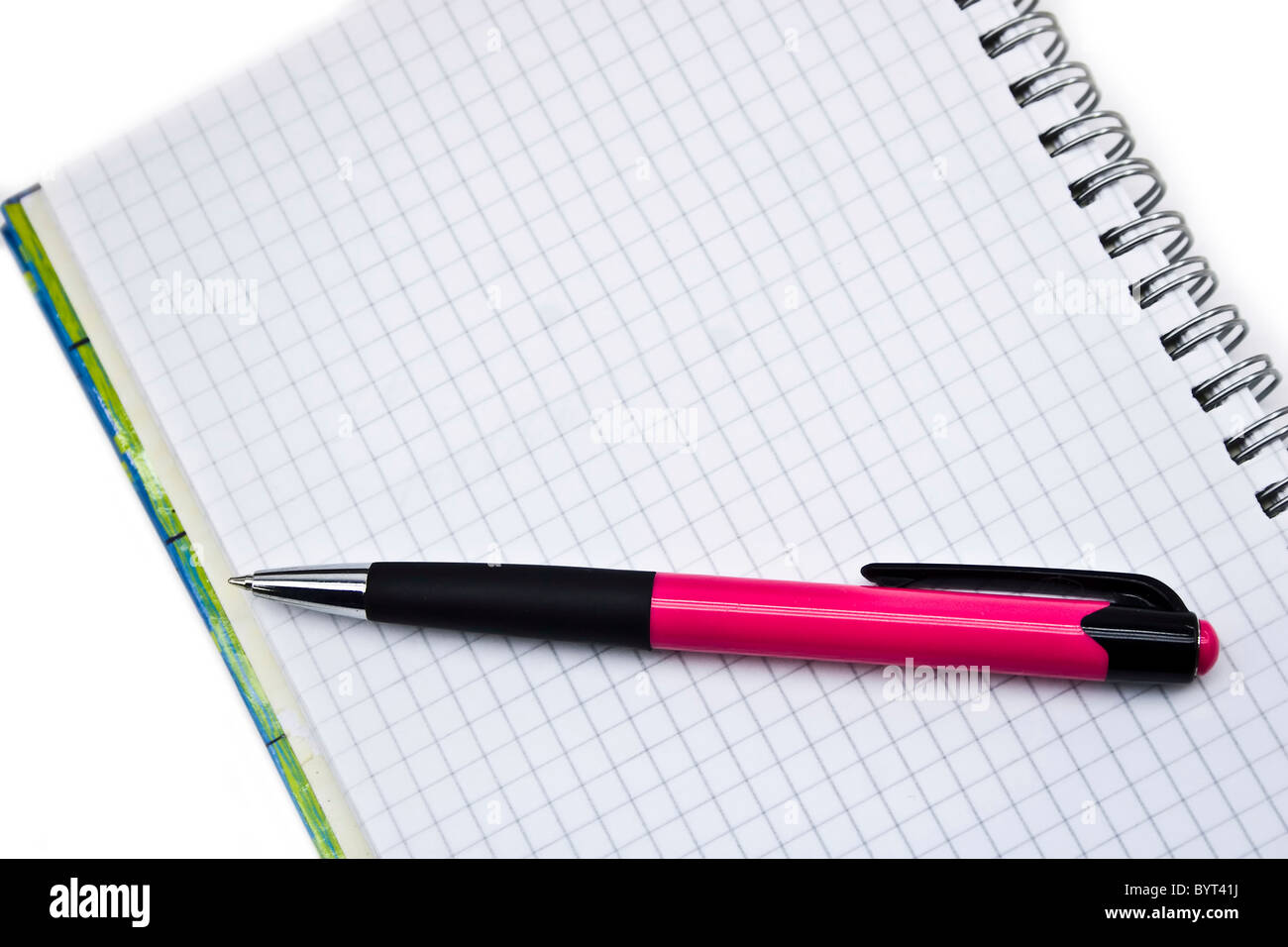 pens and books isolated on a white background Stock Photo - Alamy