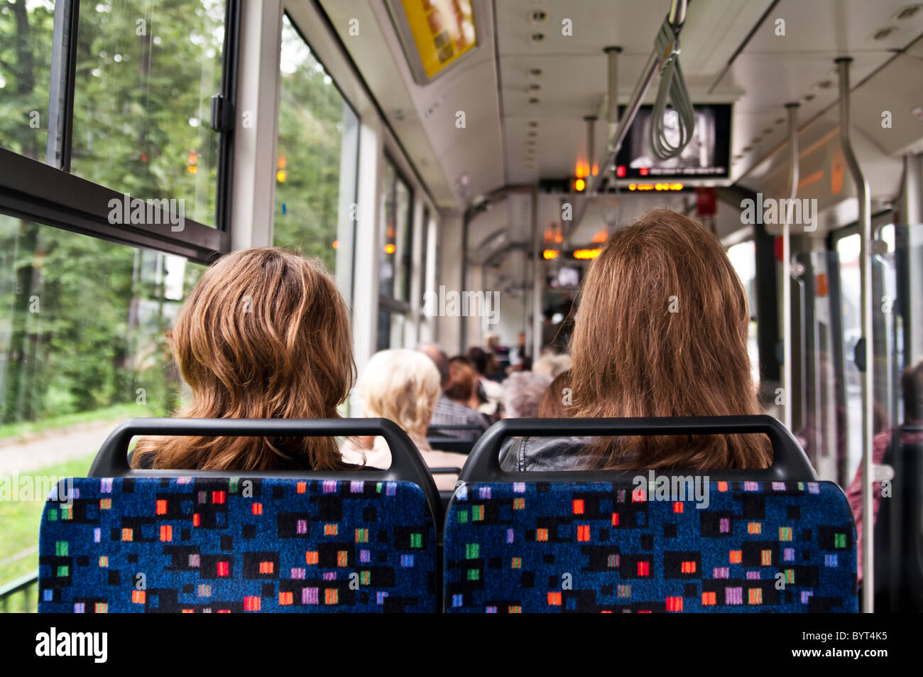passengers driving by tram Stock Photo - Alamy