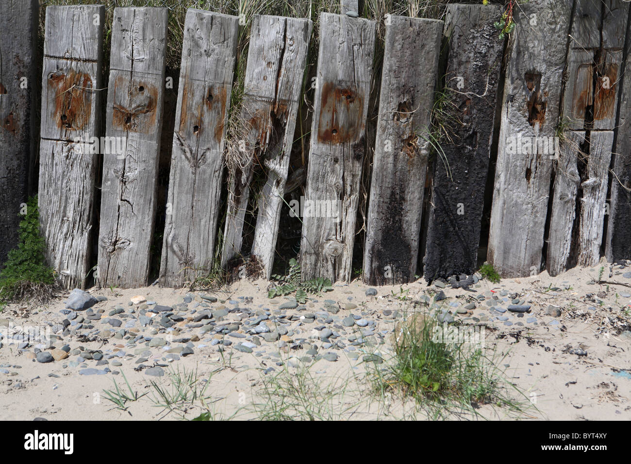 Old railway sleepers used as a fence Stock Photo - Alamy