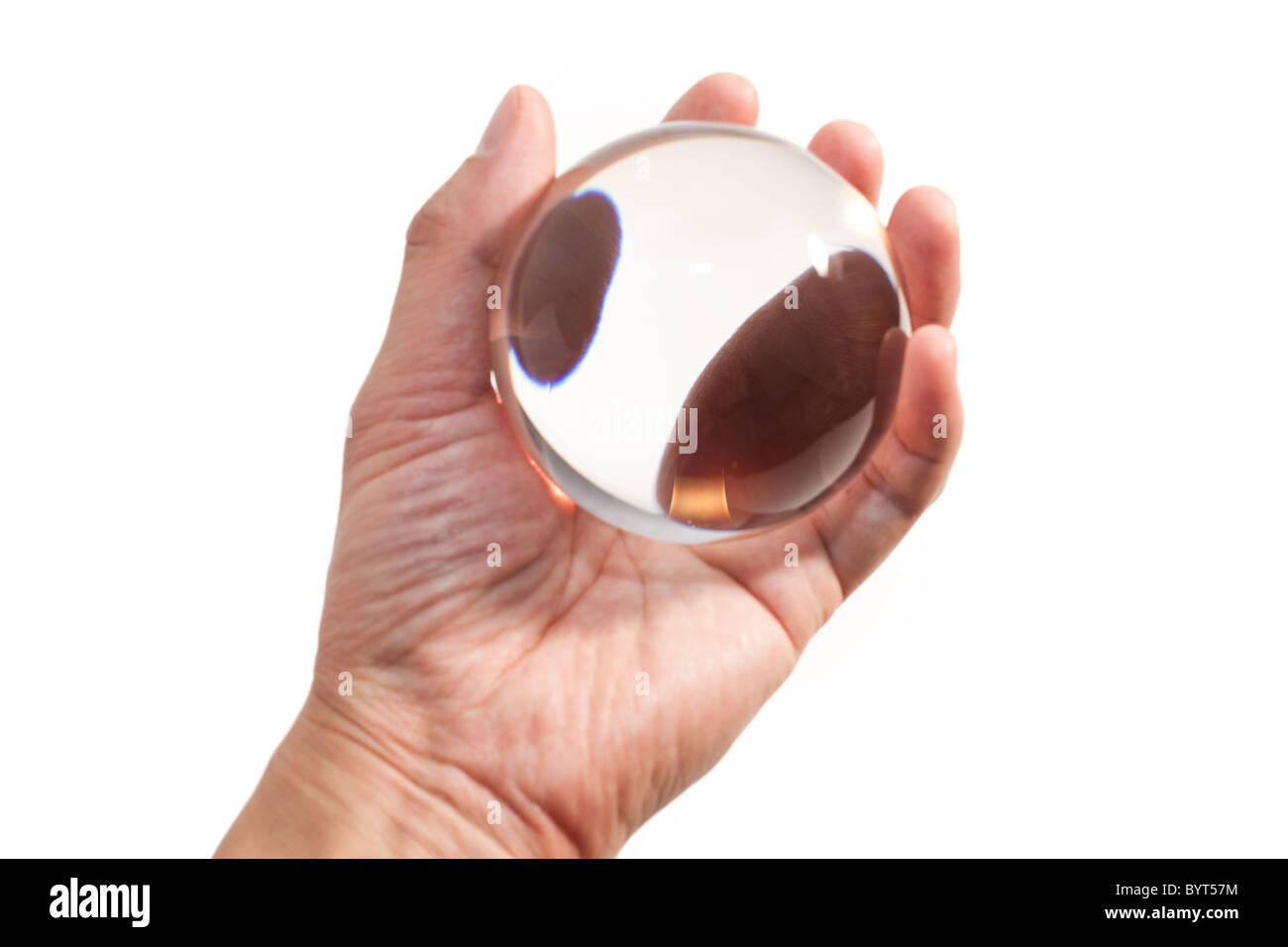 Hand holding a Crystal Ball for background Stock Photo - Alamy