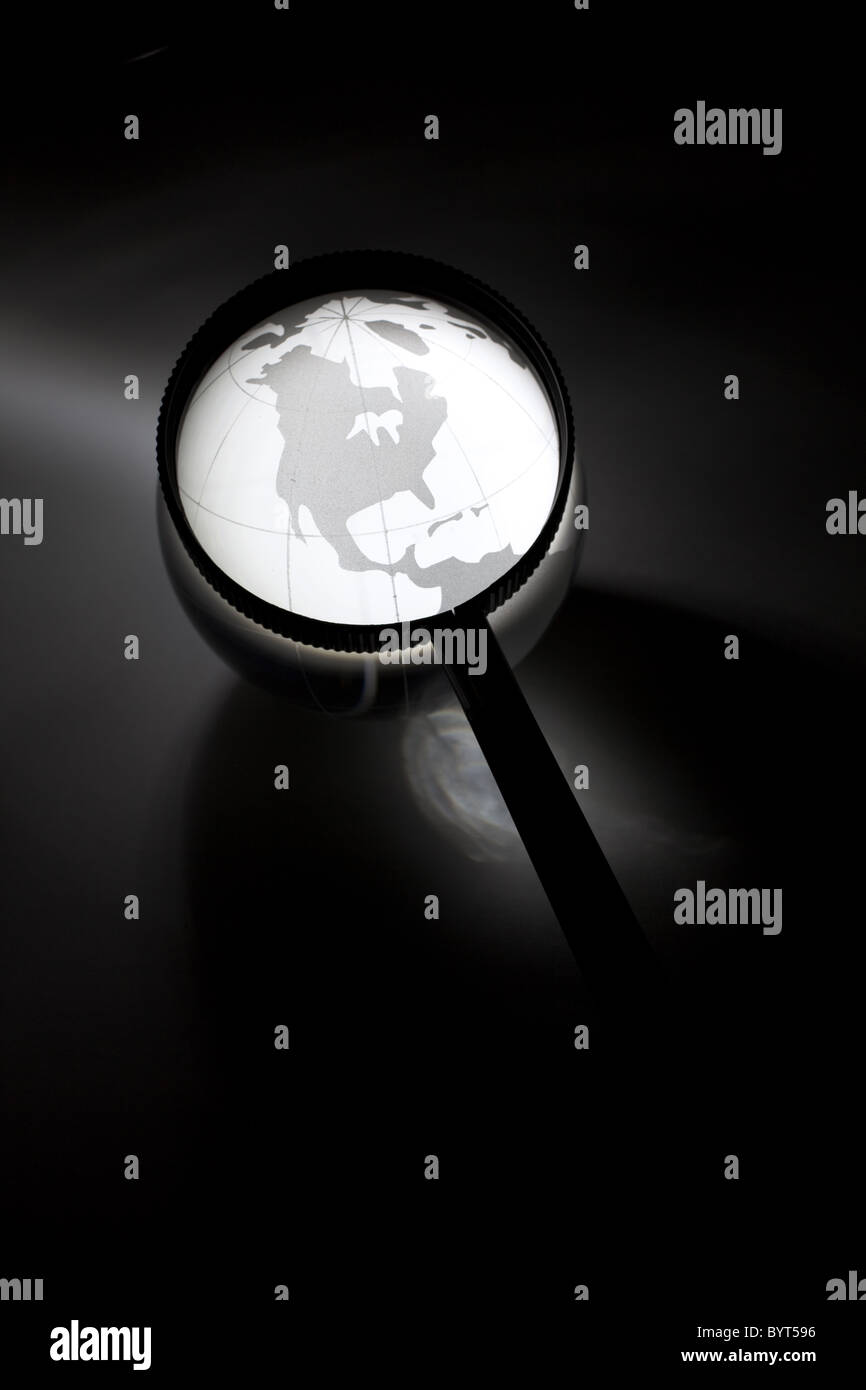 Magnifying glass globe hi-res stock photography and images - Alamy