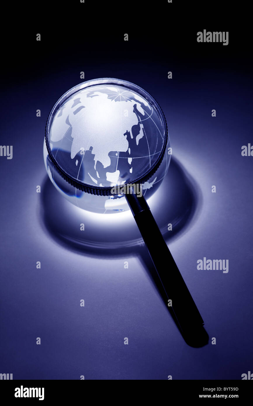 Magnifying glass globe hi-res stock photography and images - Alamy