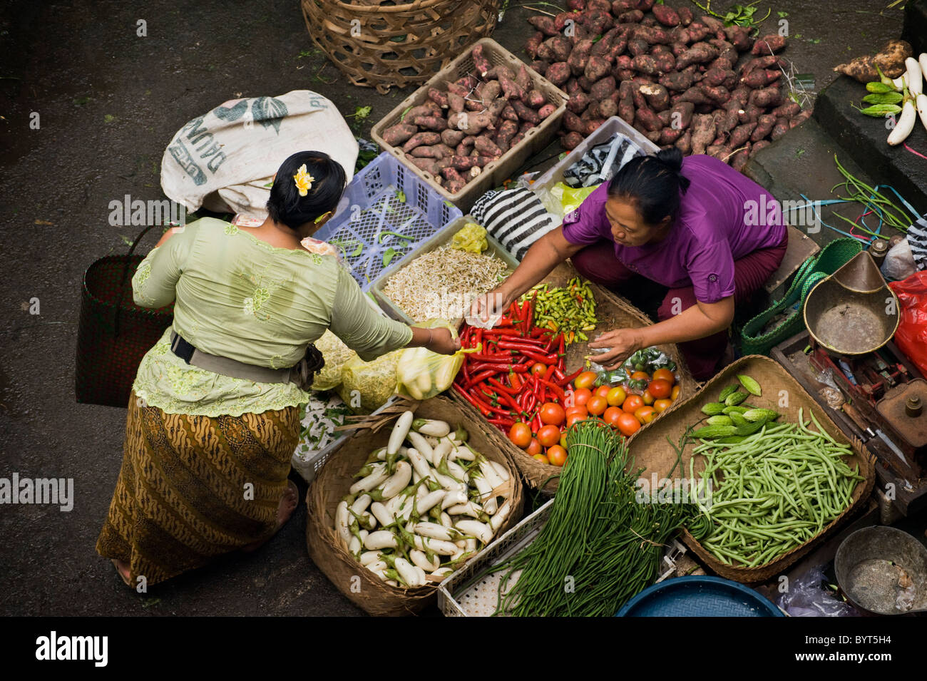 The public market in Ubud, Bali, is a colorful and busy place in the ...