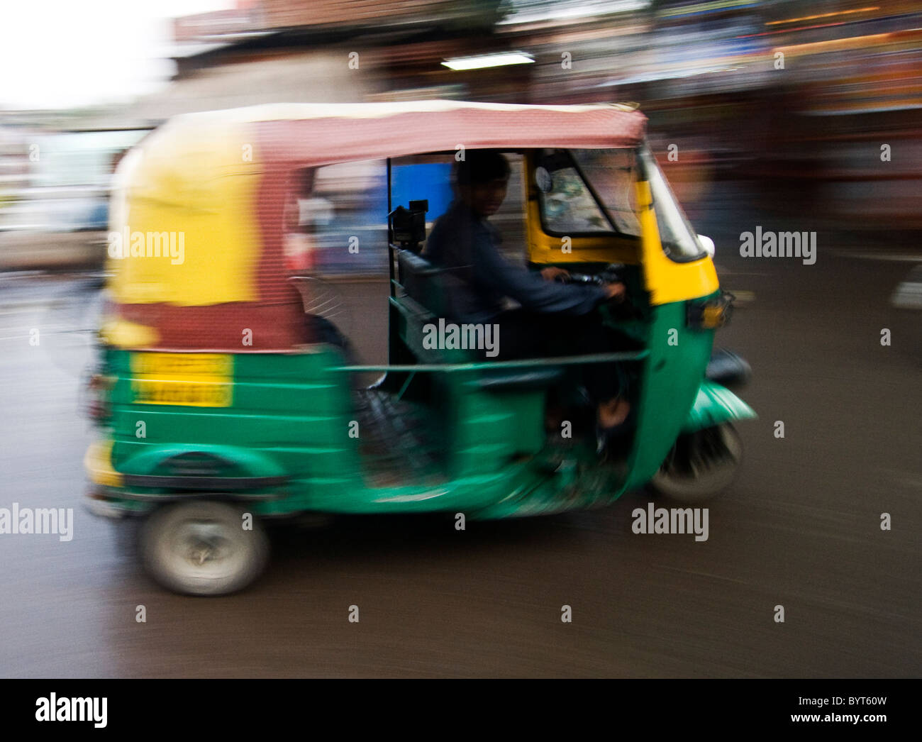 An Indian Auto rickshaw in motion Stock Photo - Alamy