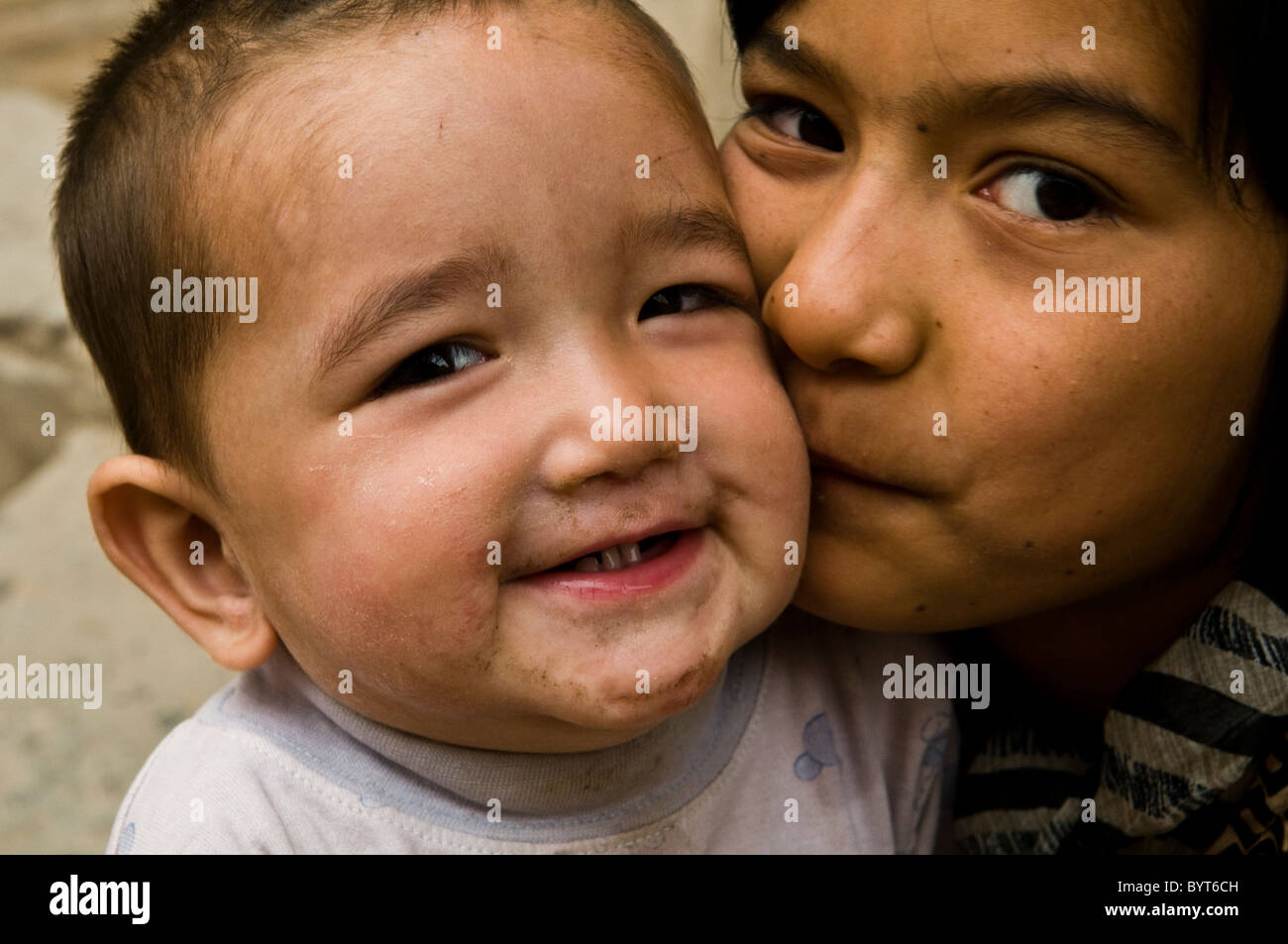Loving her little brother Stock Photo - Alamy
