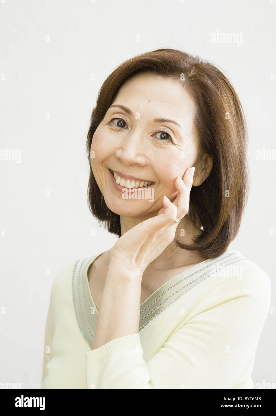 Senior woman smiling Stock Photo - Alamy
