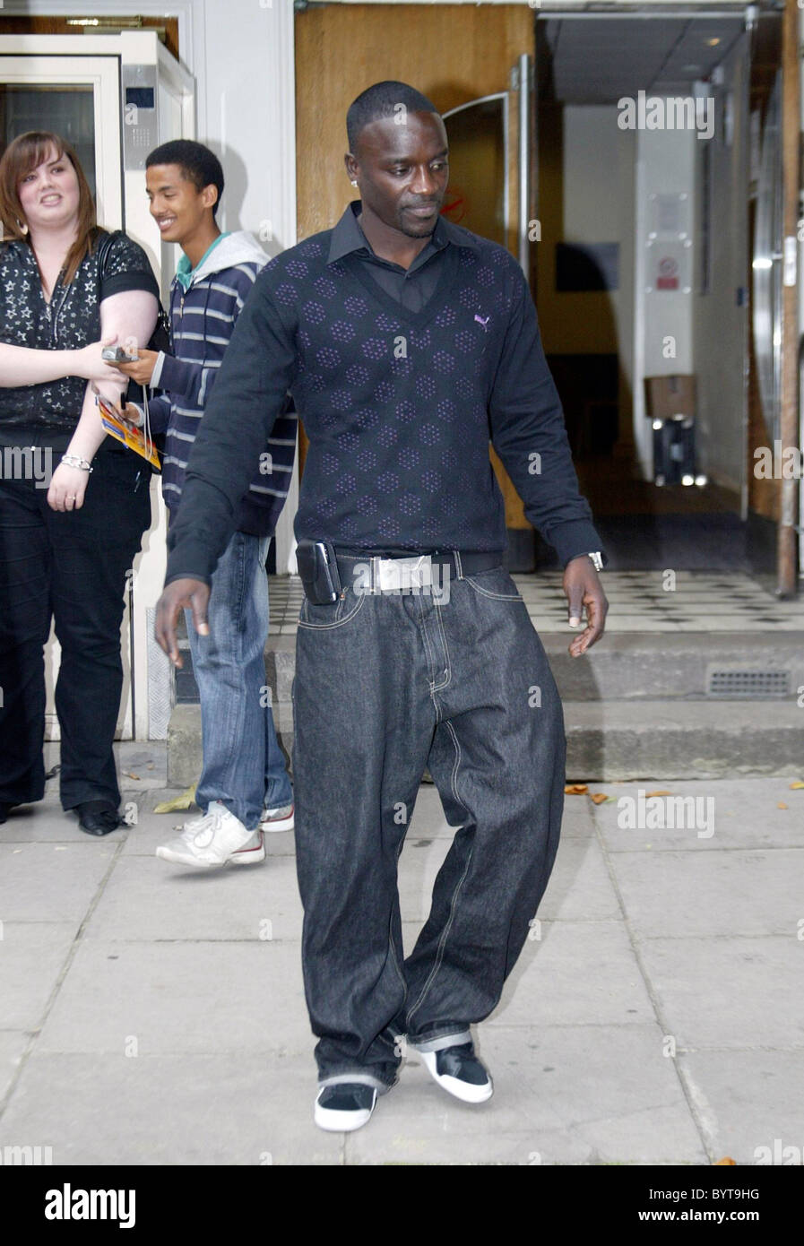 Akon signs autographs for young fans outside the BBC studios in Maida ...