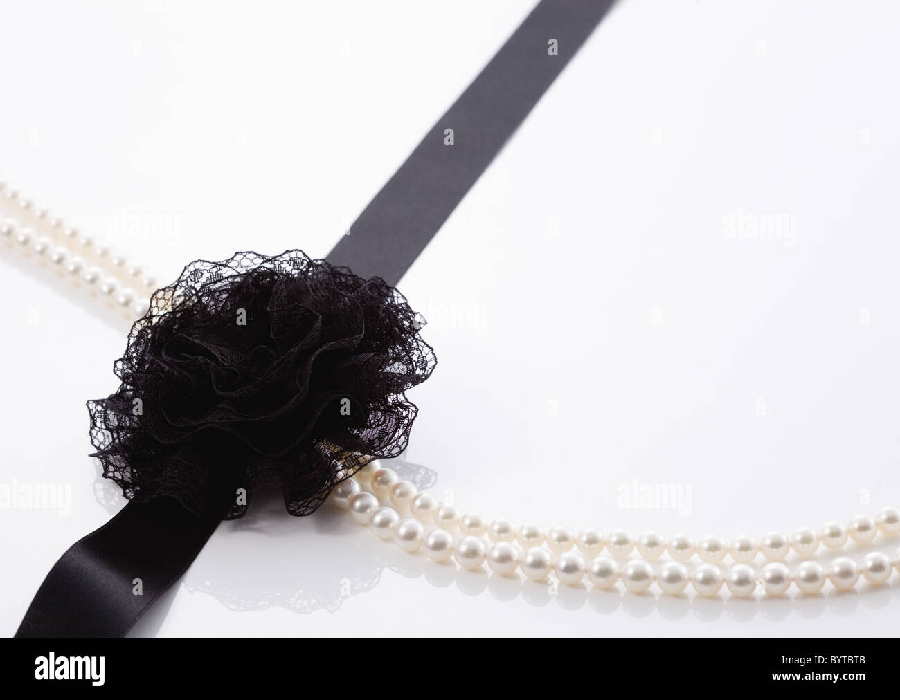 Ribbon and necklace (mourning image Stock Photo - Alamy