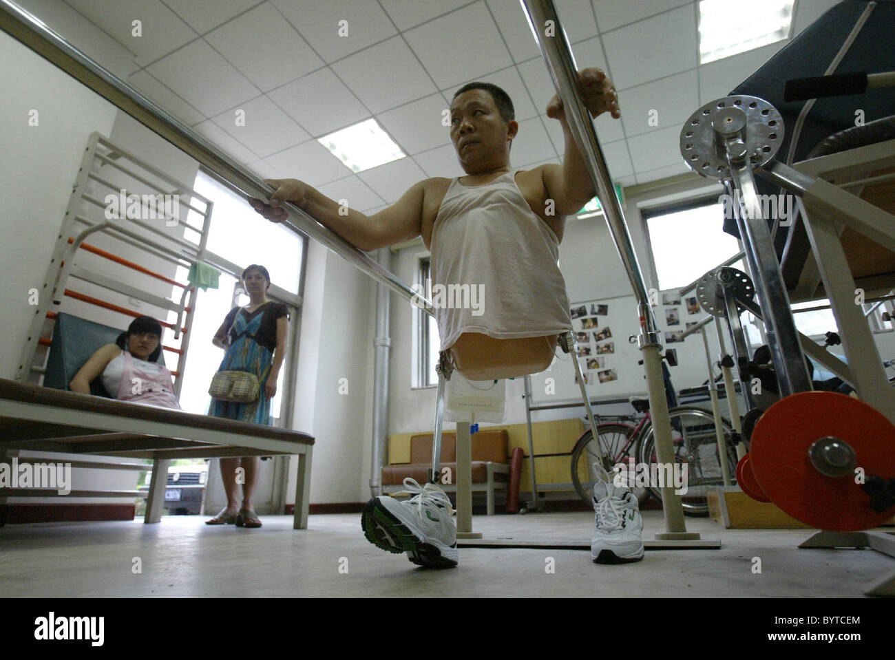 HALF MAN WALKS AGAIN Here's half-man Peng Shulin delighted to be ...