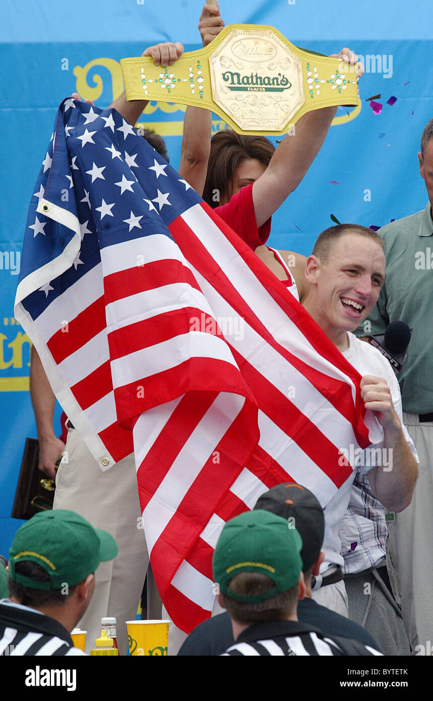 Joey Chestnut of San Jose, USA, raises his hands in victory who ...