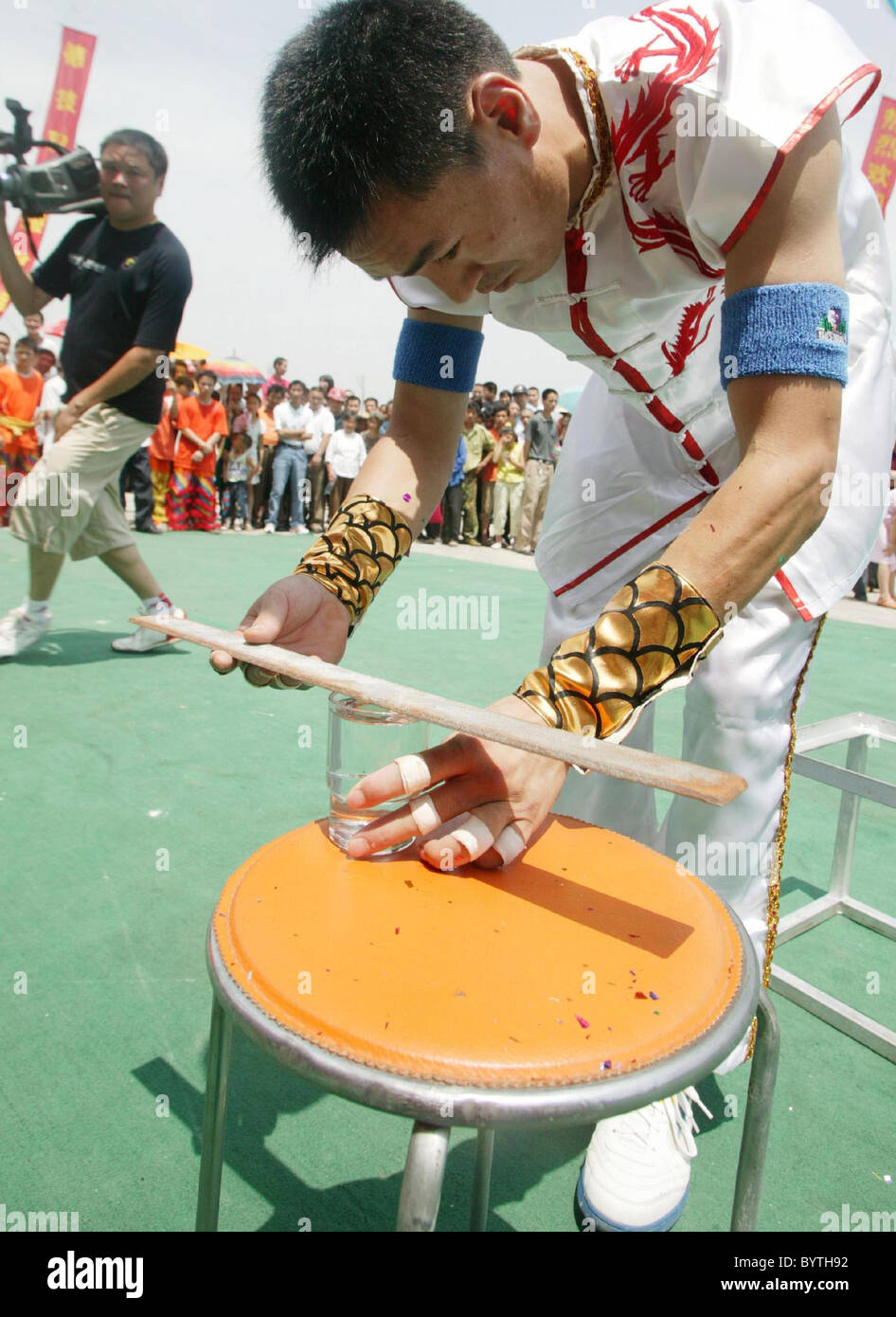 * HIT LIKE A TON OF BRICKS A martial arts hardman has made a career out ...