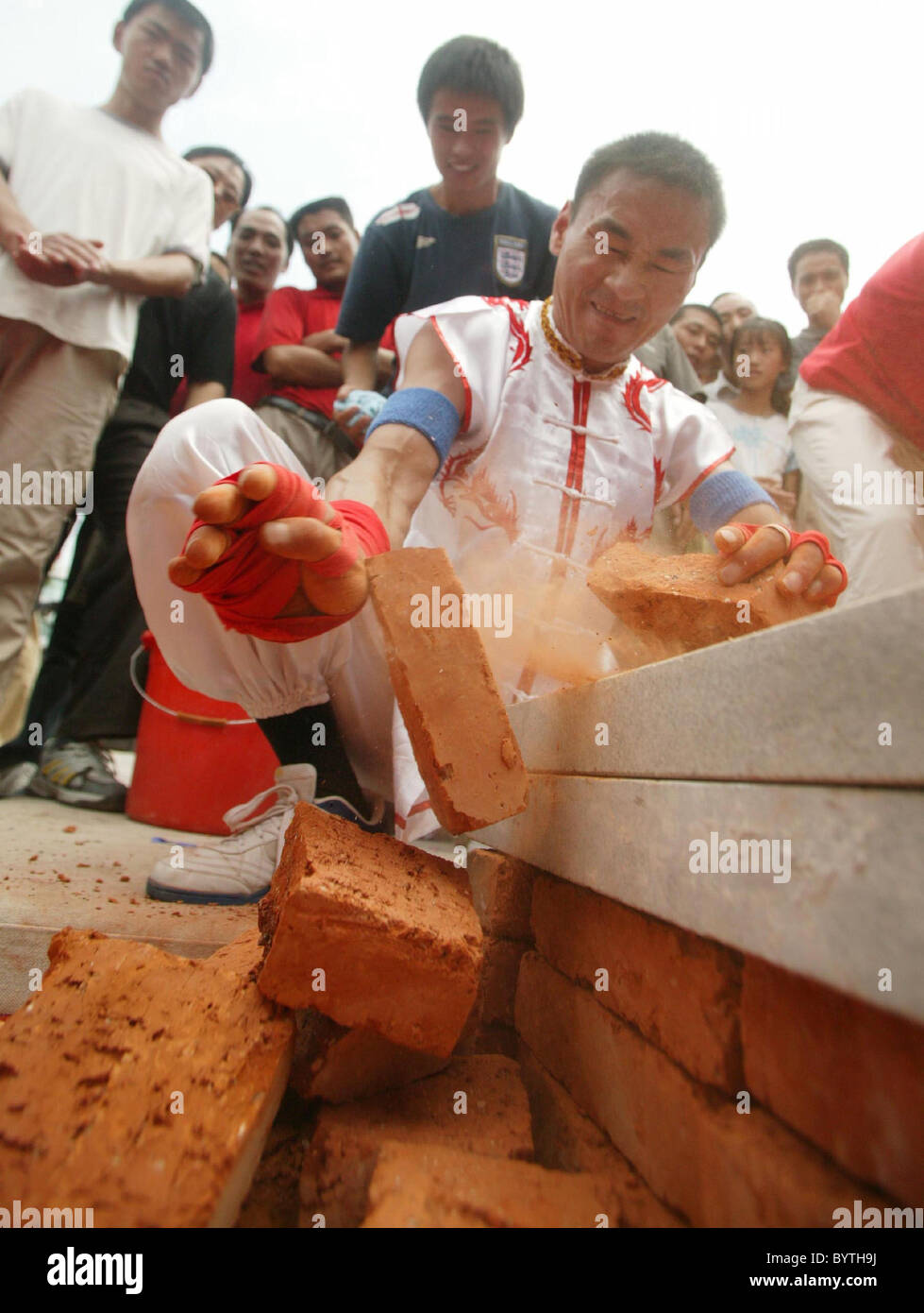 * HIT LIKE A TON OF BRICKS A martial arts hardman has made a career out ...