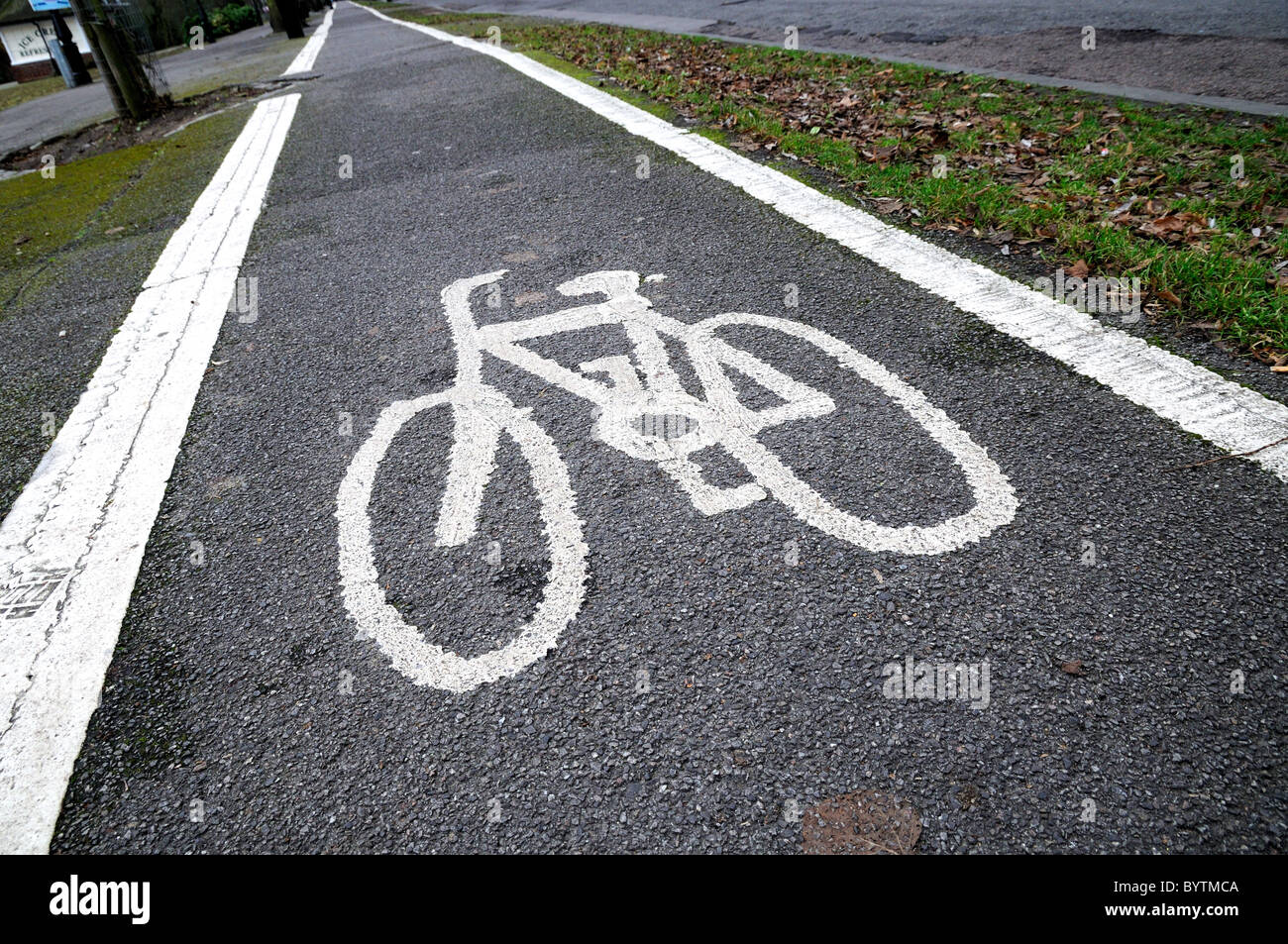Cycle lane logo on road Stock Photo - Alamy