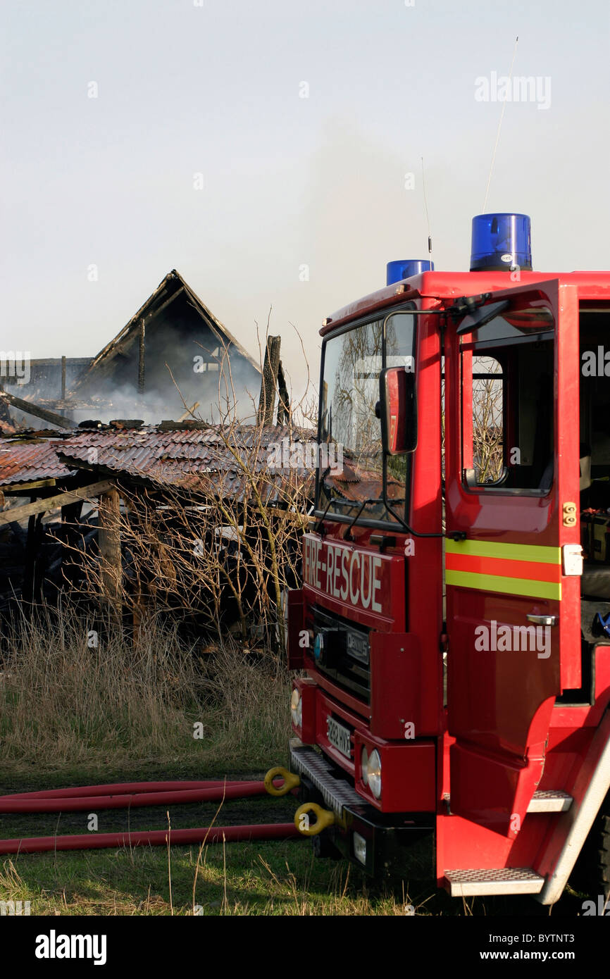 Dennis fire engine at scene of a barn fire Stock Photo - Alamy
