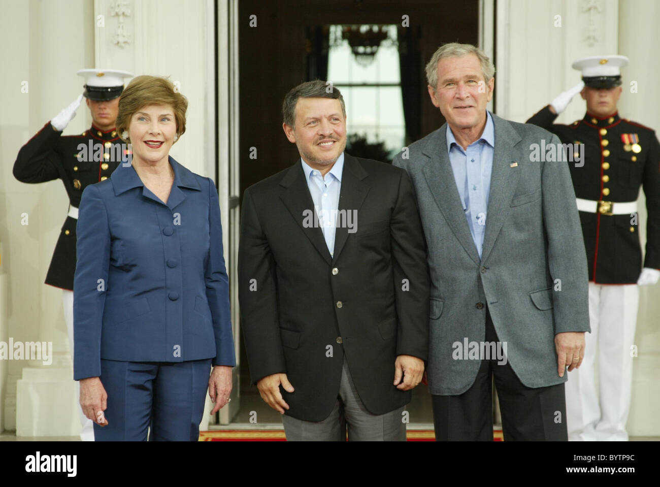 US President George W Bush and Laura Bush greeted King Abdullah II of ...