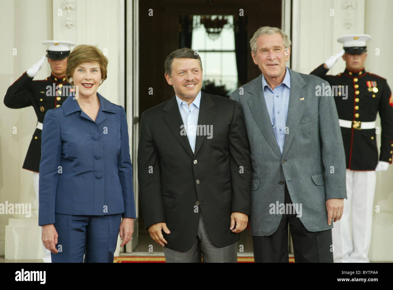 US President George W Bush and Laura Bush greeted King Abdullah II of ...