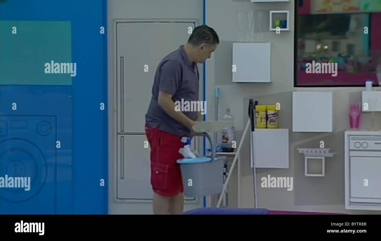 Big Brother 8 - Day 25 Jonathan Durden prepares to clean the bathroom ...