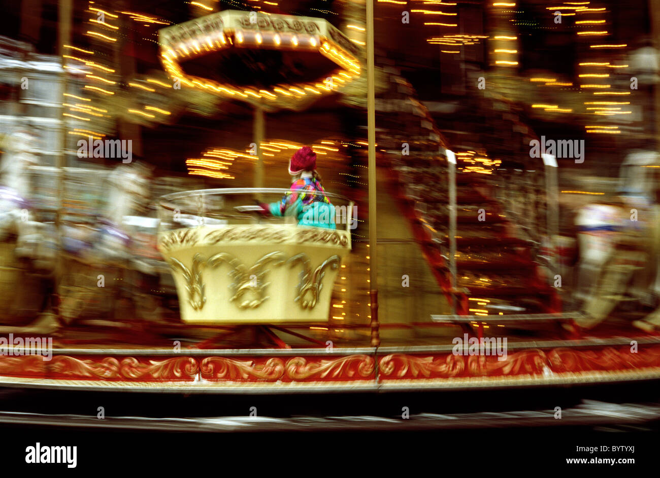 Merry-go-round at the Christmas Market at Römerberg in the German city ...