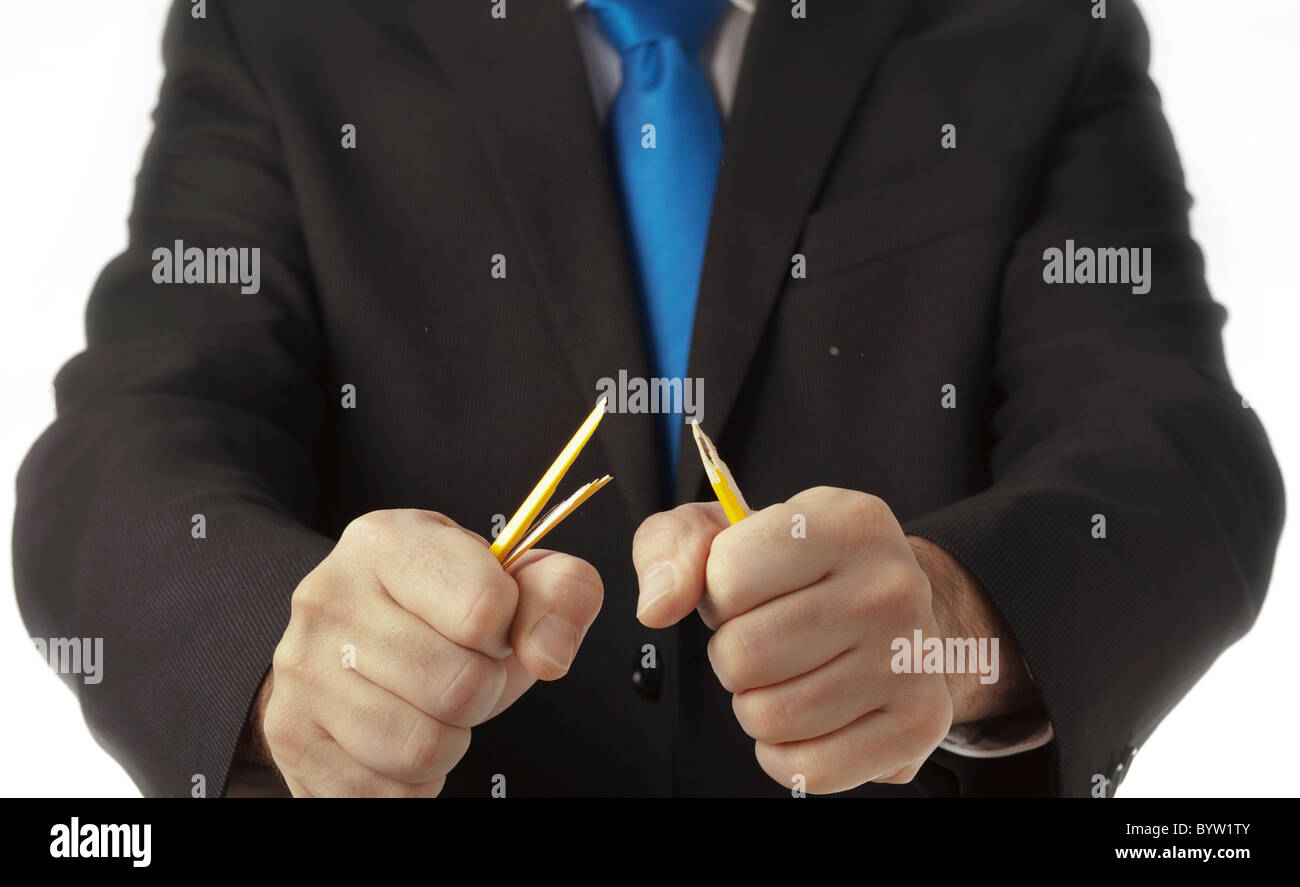 Hands breaking pencil hi-res stock photography and images - Alamy