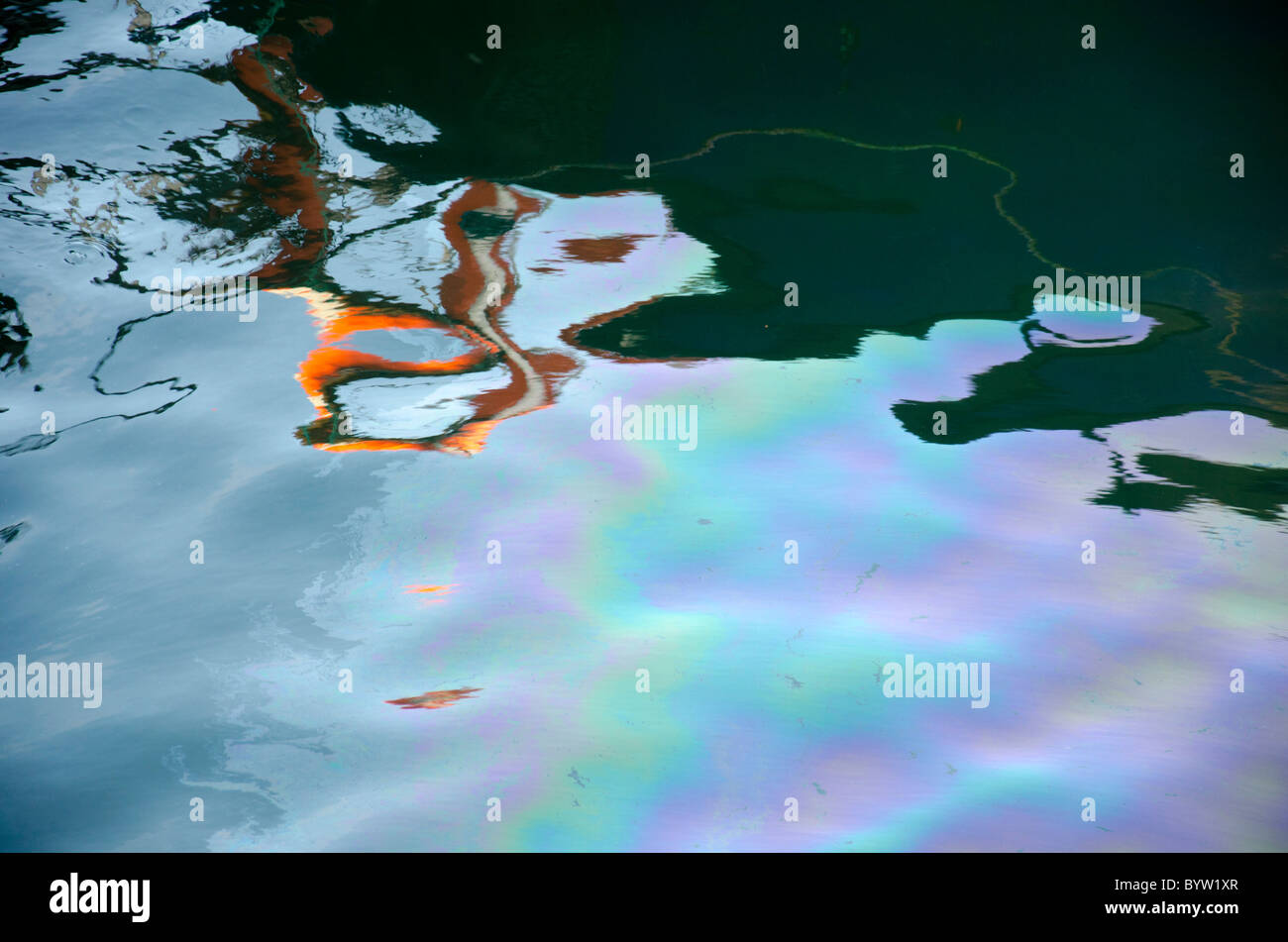 Oil on the water at Dunbar Harbour, East Lothian, Scotland Stock Photo ...