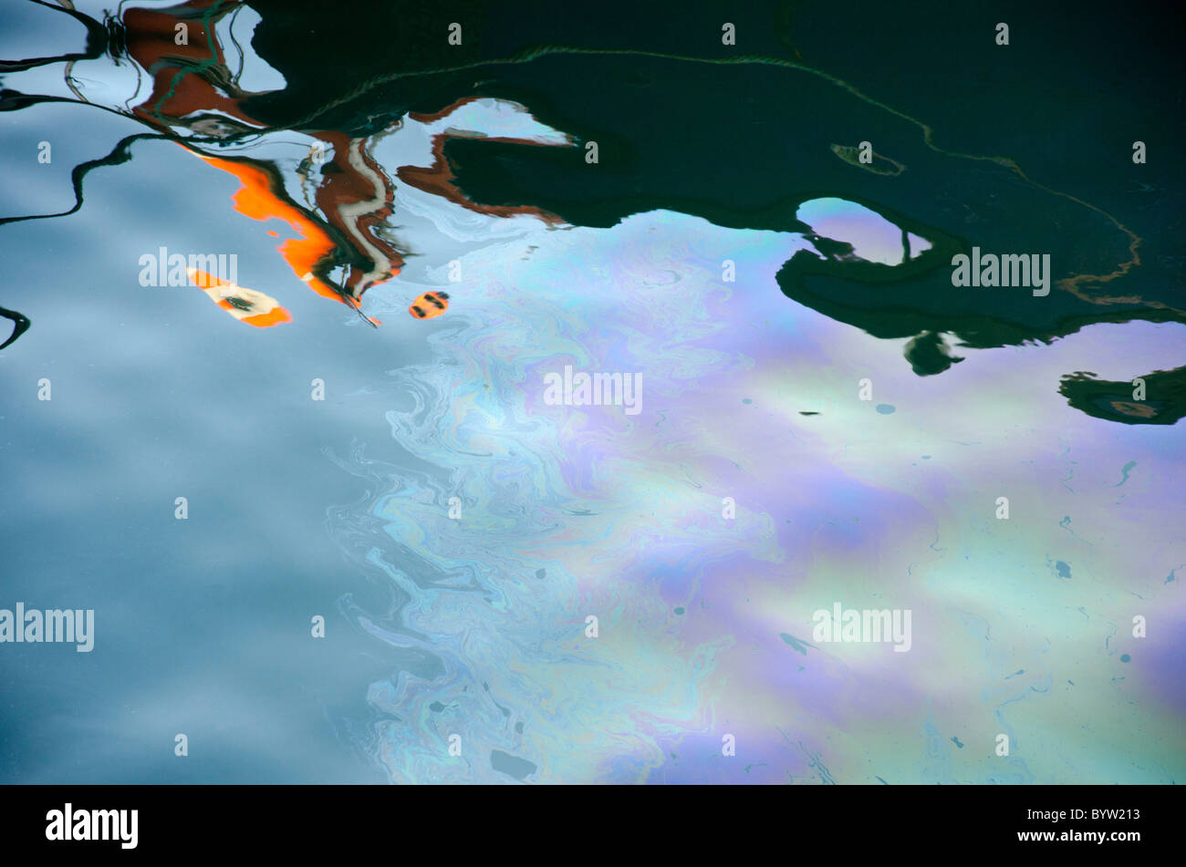 Oil on the water at Dunbar Harbour, East Lothian, Scotland Stock Photo ...