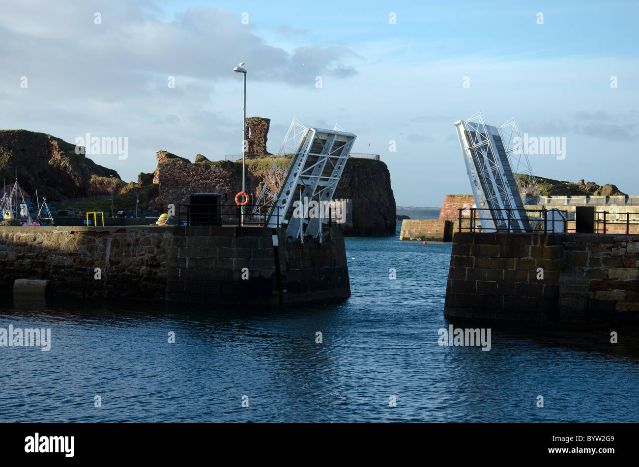 The lift bridge between the inner and outer Harbours at Dunbar, East ...