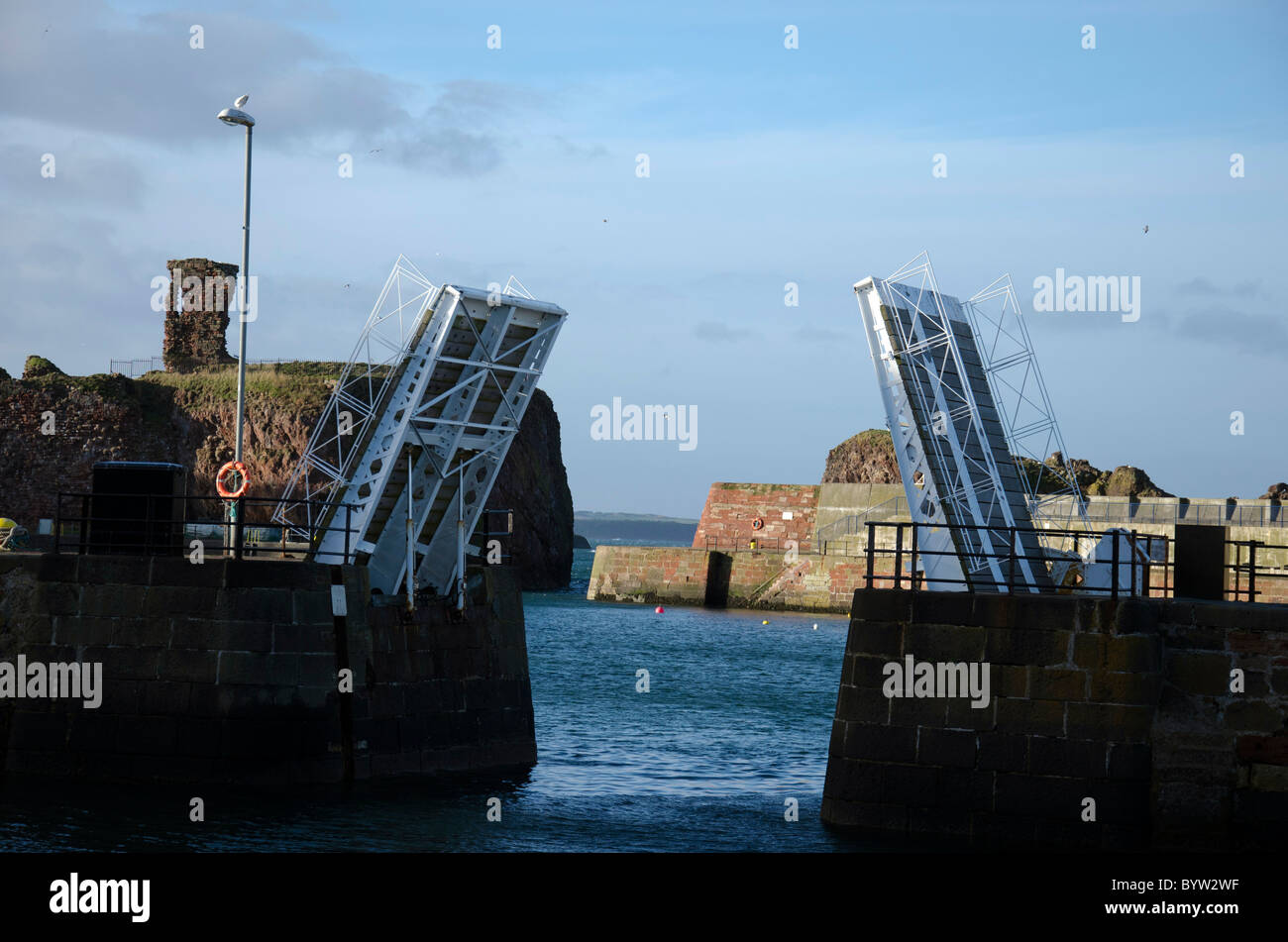 The lift bridge between the inner and outer Harbours at Dunbar, East ...