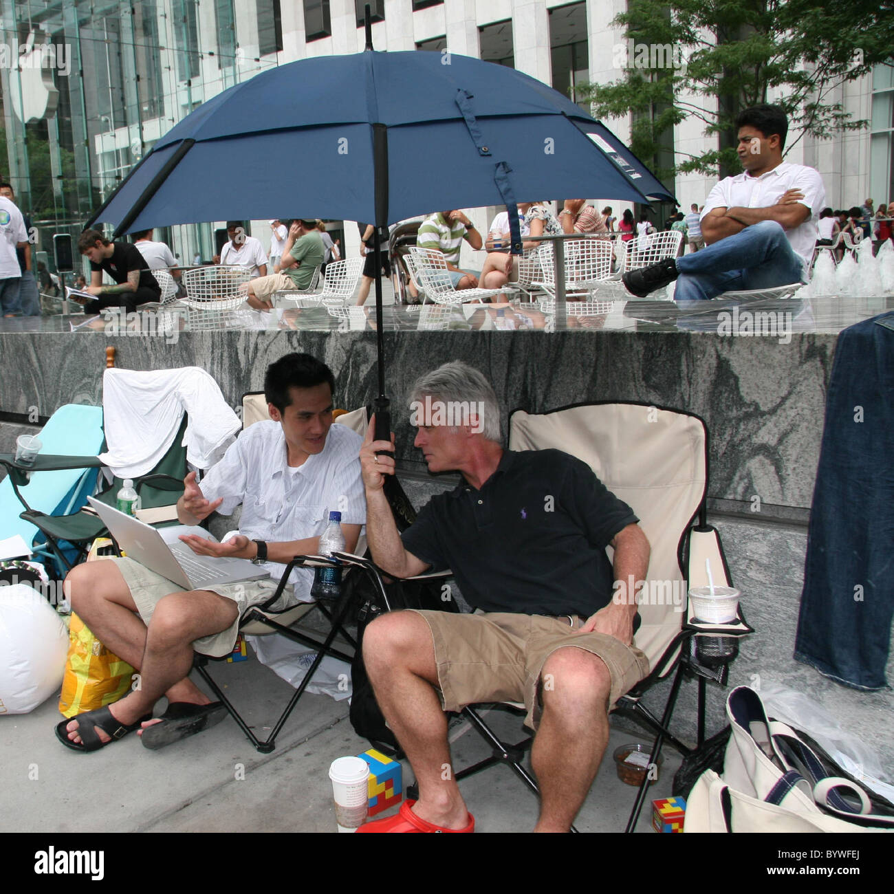 People camping outside the Apple Store for the iPhone to go on sale ...
