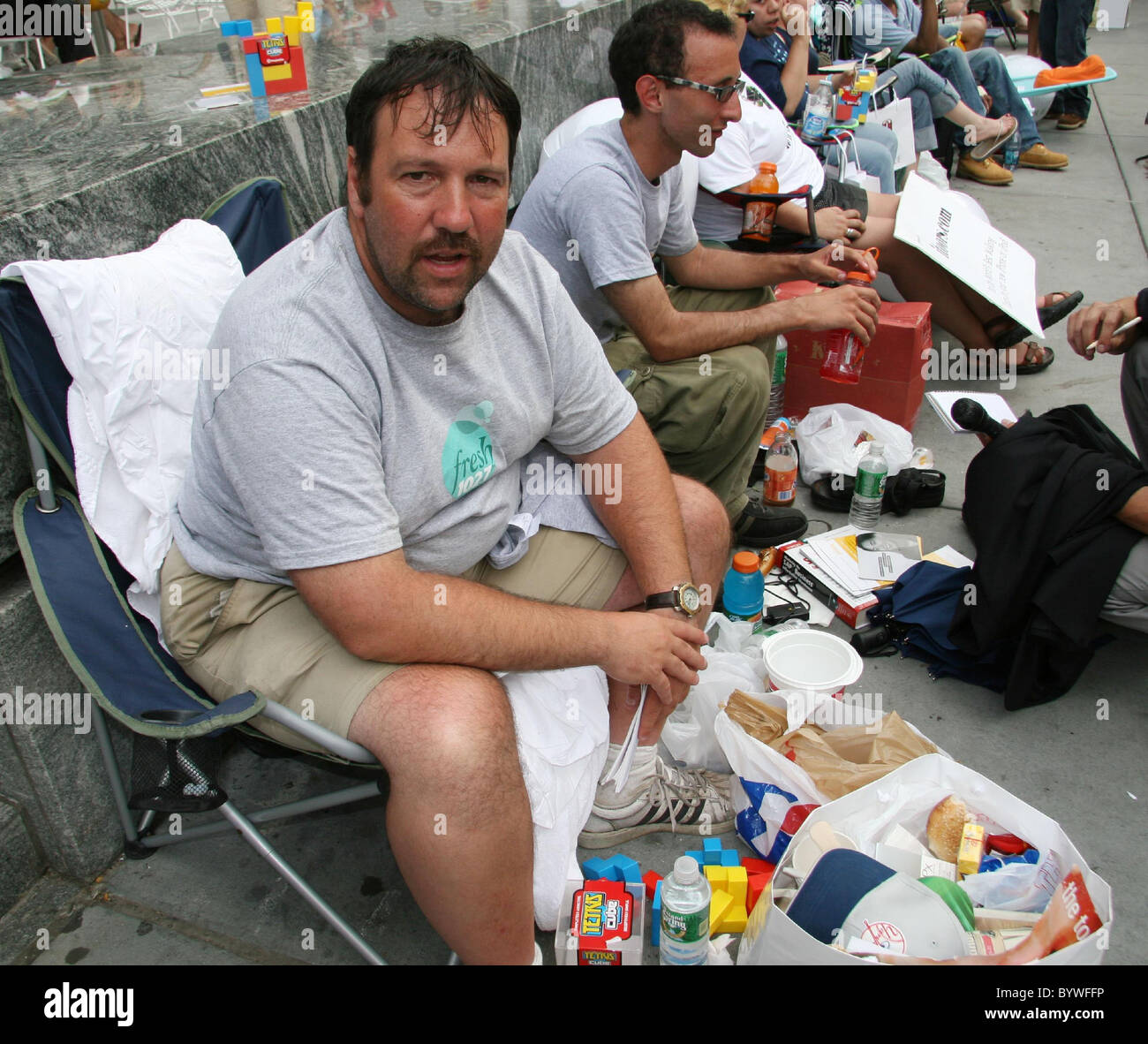 People camping outside the Apple Store for the iPhone to go on sale ...