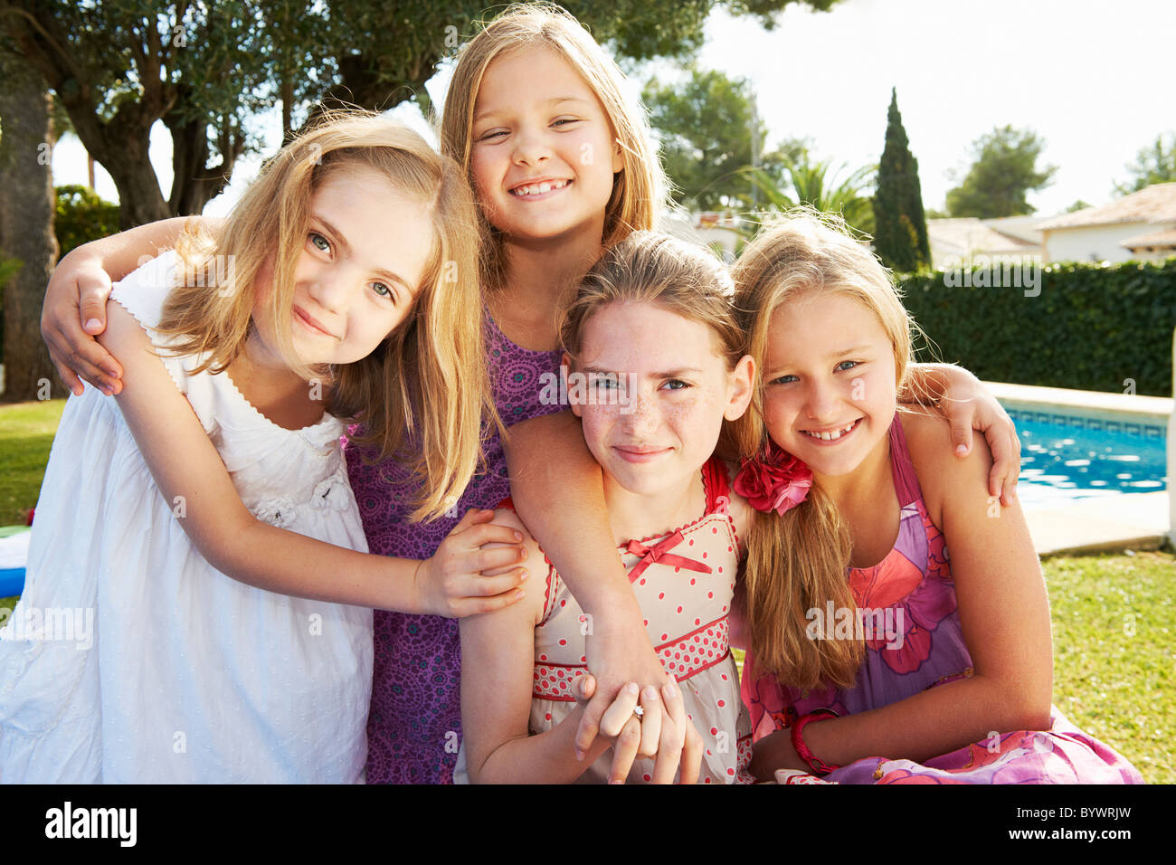 Group of girls hugging Stock Photo - Alamy