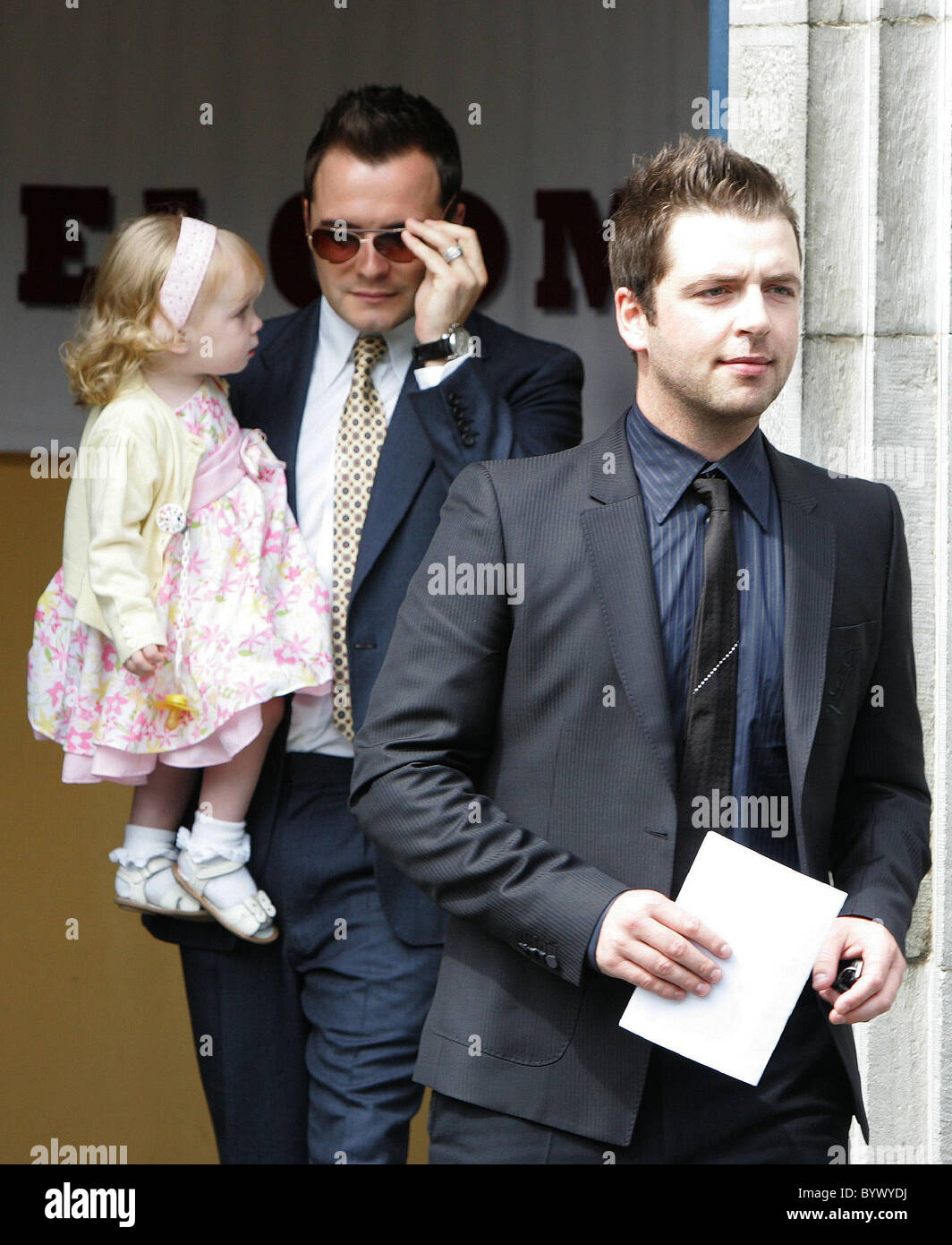 Shane Filan and daughter Nicole with Mark Feehily at the christening of ...