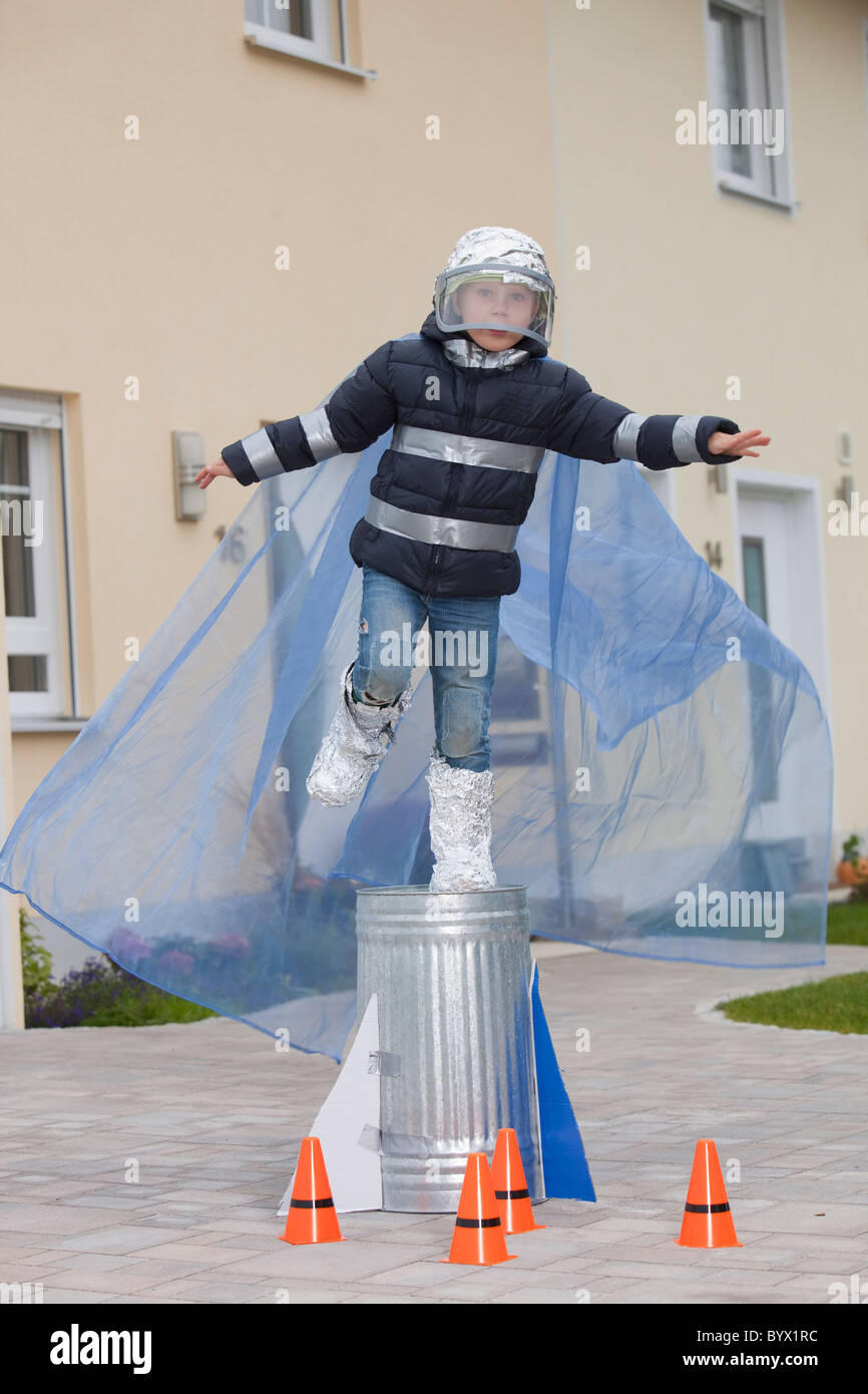 Boy trying to fly hi-res stock photography and images - Alamy