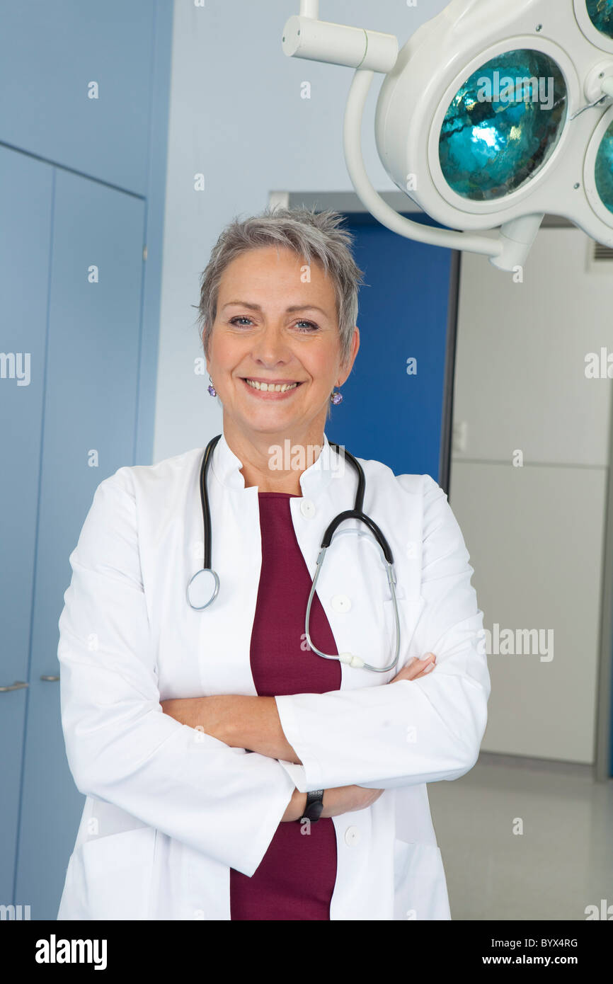 Portrait of female doctor, laughing Stock Photo - Alamy