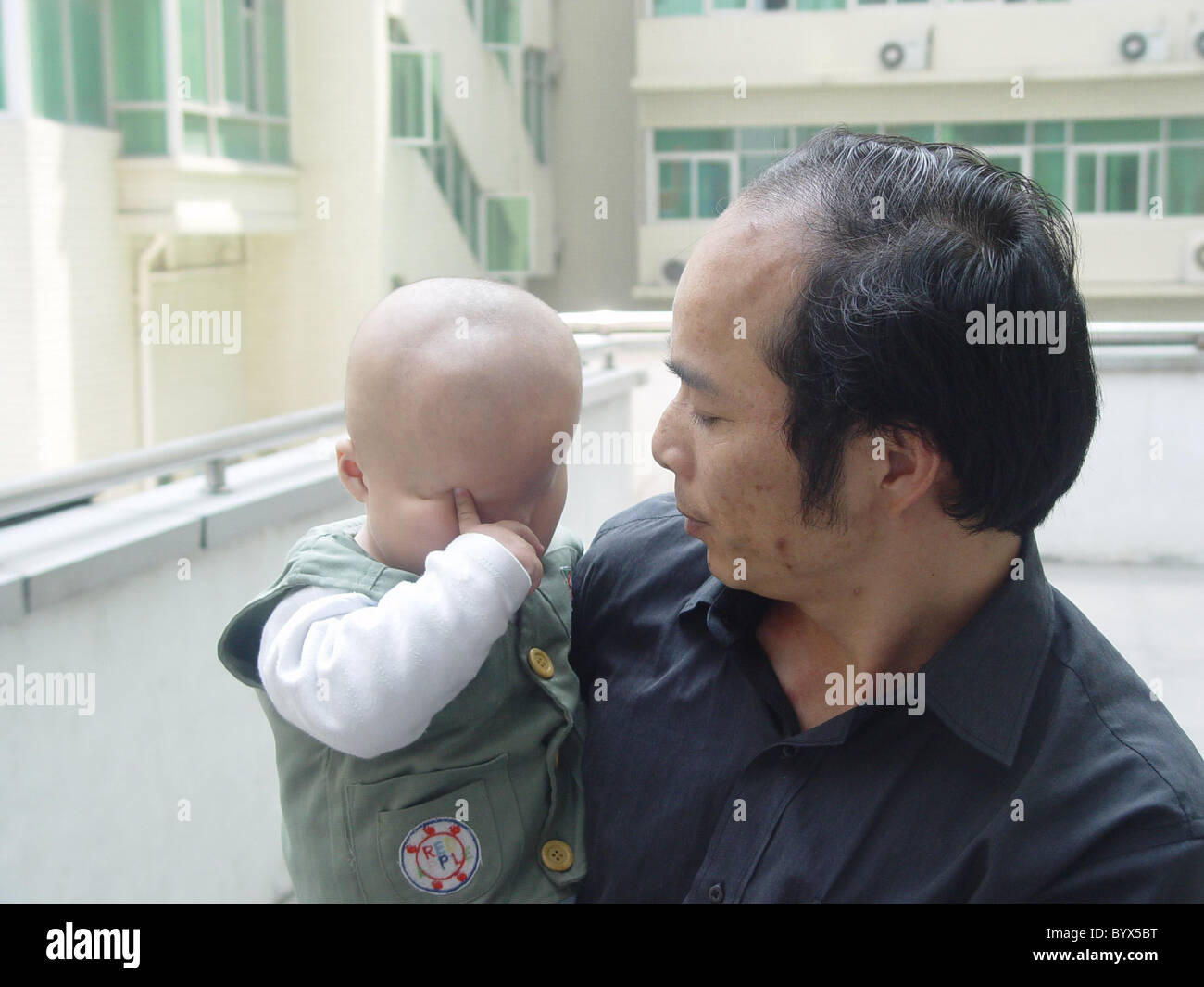 SIGHT FOR SORE EYES This child is blind to the world around him ...