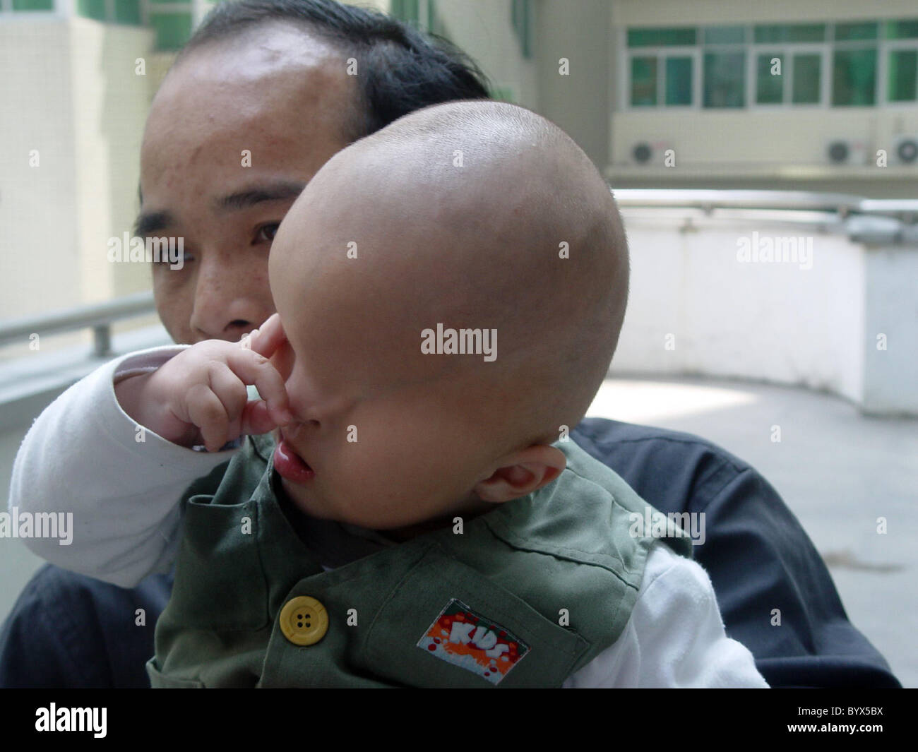 SIGHT FOR SORE EYES This child is blind to the world around him ...