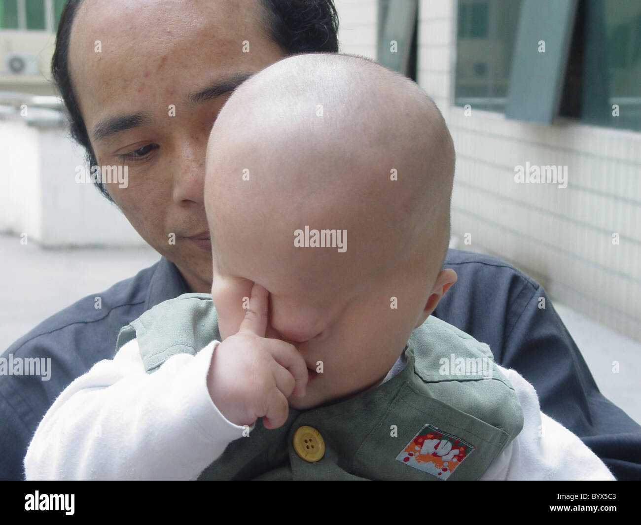 SIGHT FOR SORE EYES This child is blind to the world around him ...