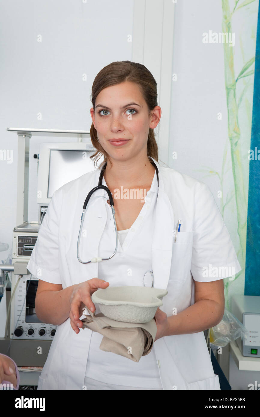 Nurse with set of instruments Stock Photo - Alamy