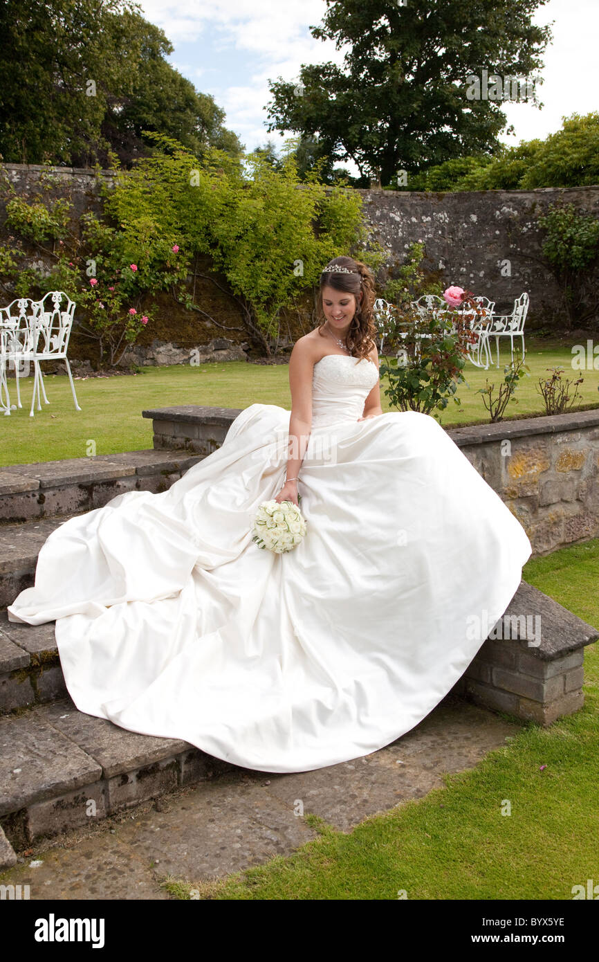 Happy Bride at wedding reception Stock Photo - Alamy
