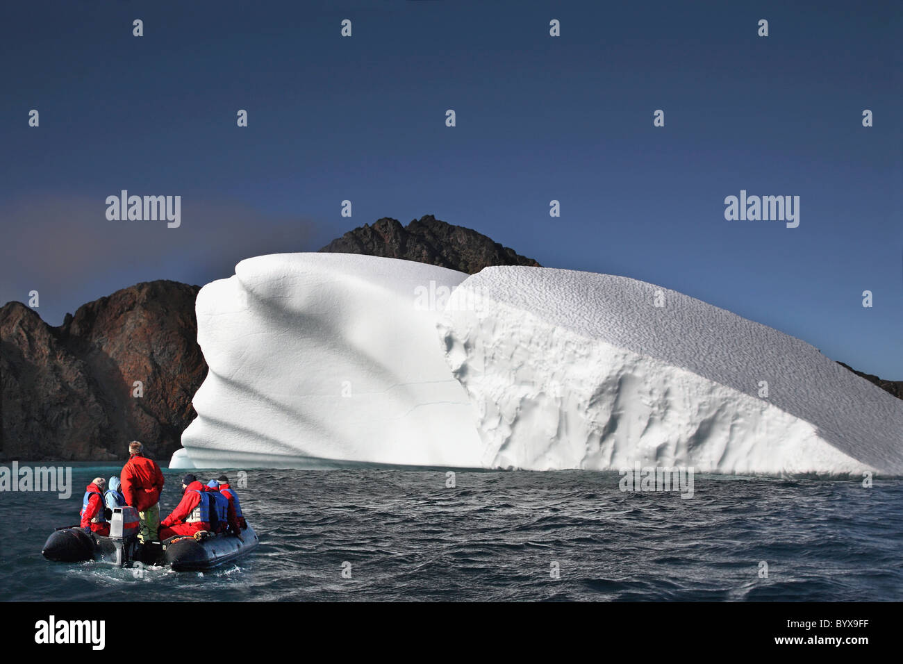 unique iceberg and tourists off the coast; devon island, nunavut ...