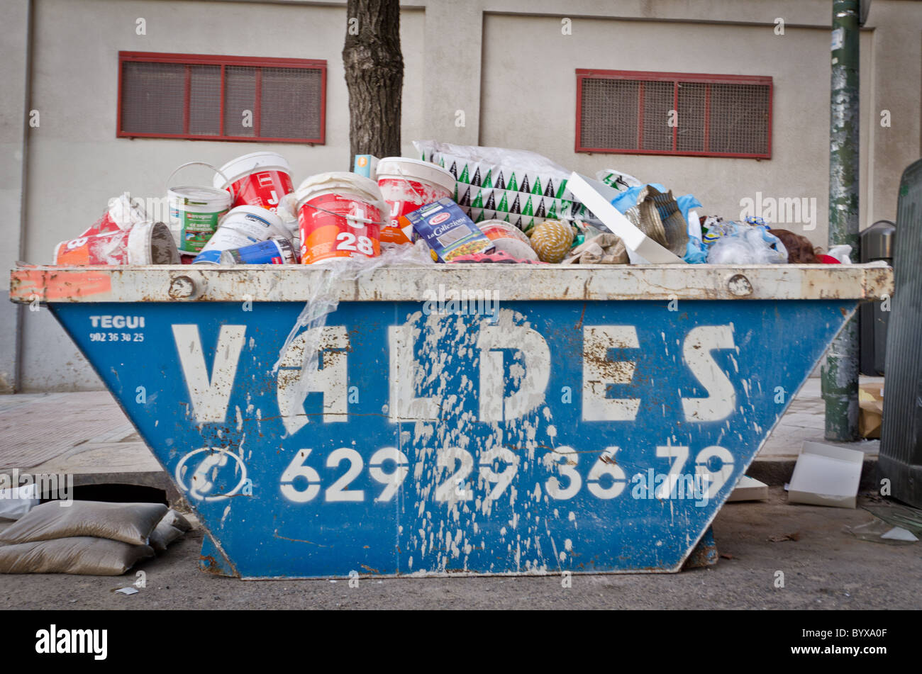 Skip full of builders rubble hi-res stock photography and images - Alamy