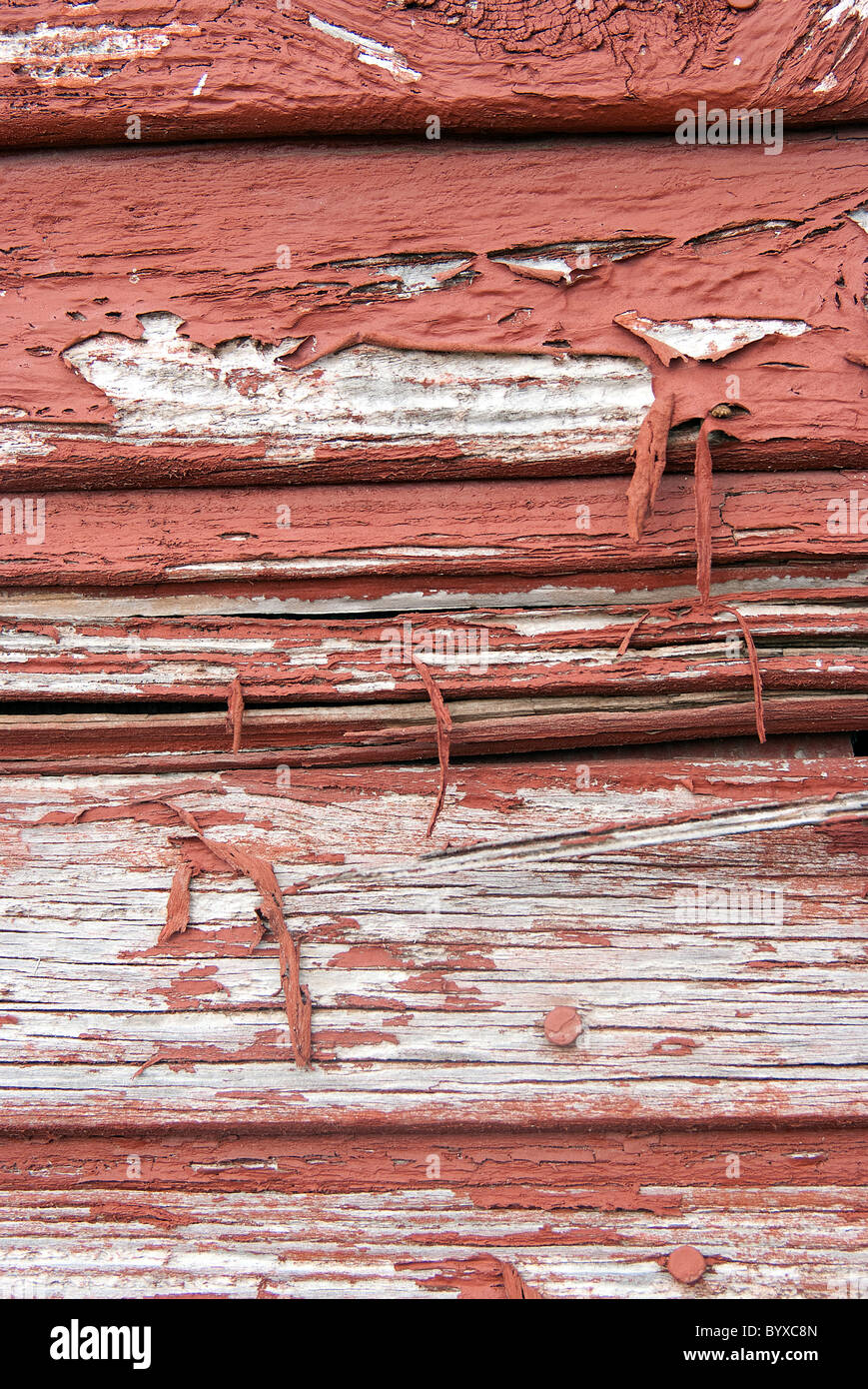 Red barn door, close ups showing texture Stock Photo - Alamy