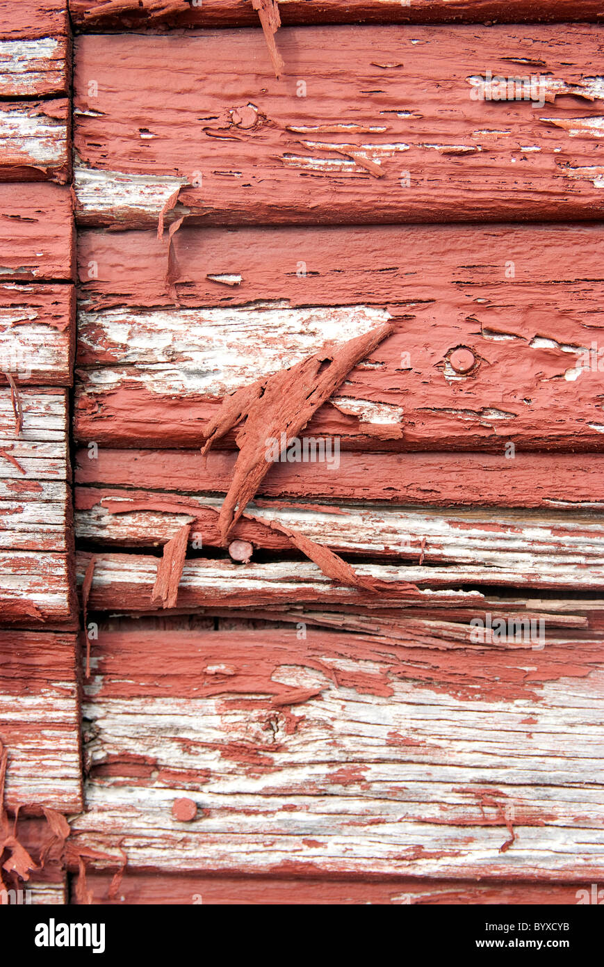 Red barn door, close ups showing texture Stock Photo - Alamy